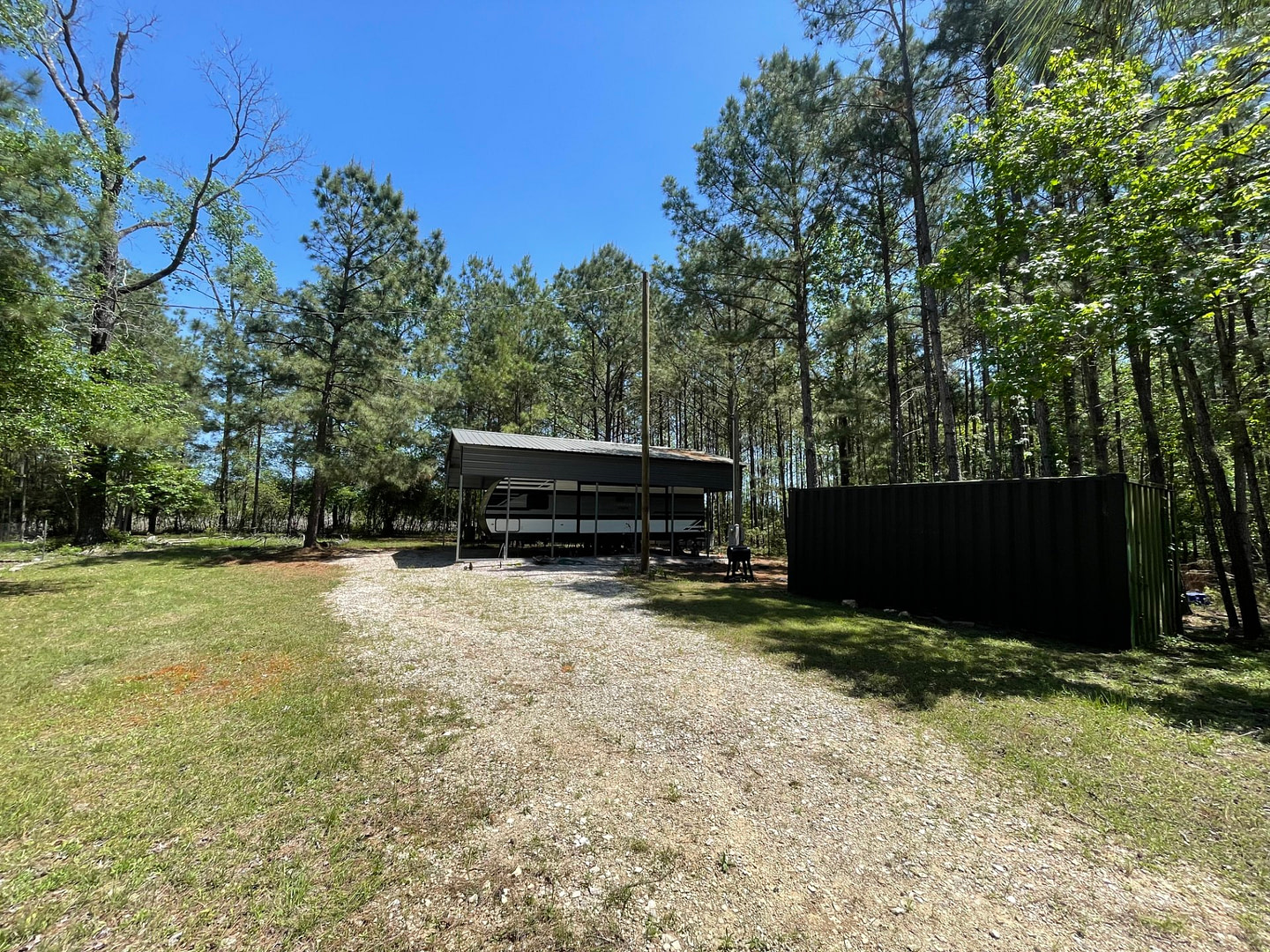 5.7 Acres Unrestricted Totally Hidden with Turn-Key RV Pad & Overhang ...
